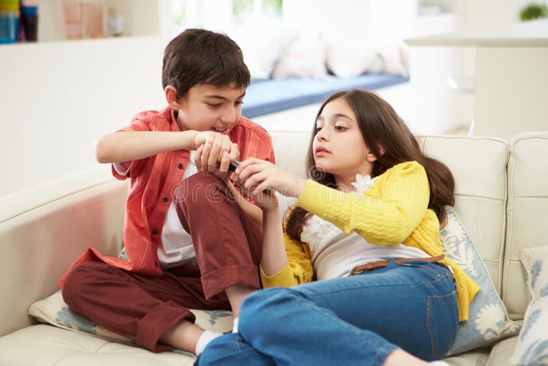 Two Hispanic Children Arguing Stock Photo - Image of hispanic, remote ...