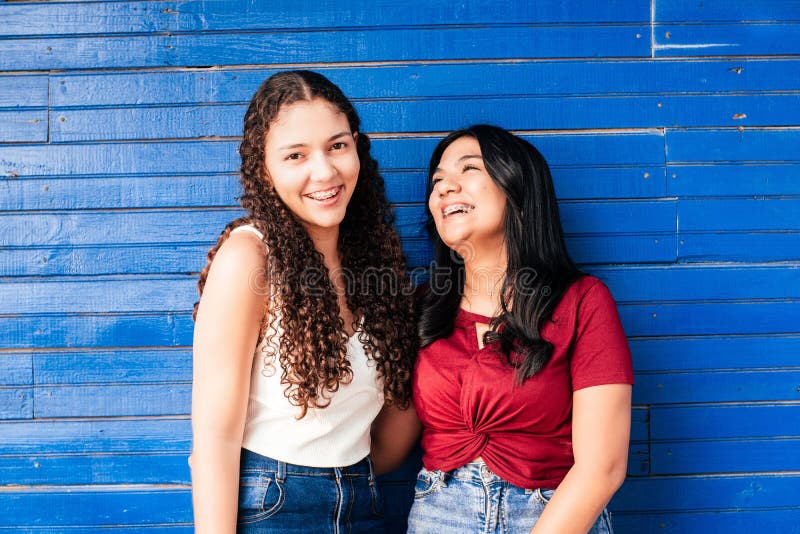 Two Hispanic Friends with Brackets Laughing Together Stock Image ...