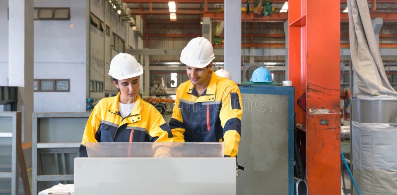 Two Hispanic Labor Dressed in Hardhat and Polyester Jacket Uniform ...