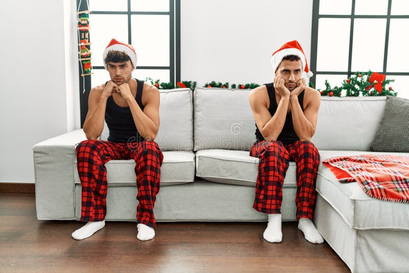 Two Hispanic Men Couple Arguing Sitting by Christmas Tree at Home Stock ...