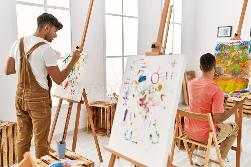 Two Hispanic Men Couple Drawing at Art Studio Stock Photo - Image of ...