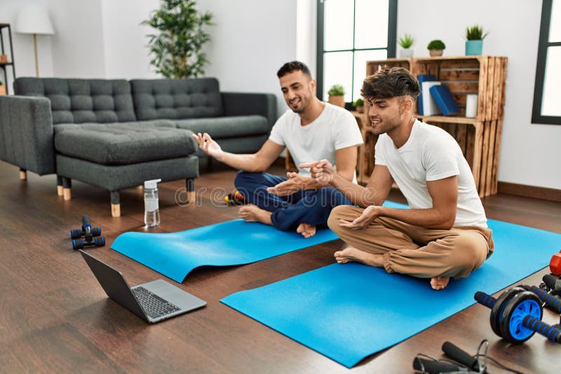 Two Hispanic Men Couple Smiling Confident Having Video Call at Home ...