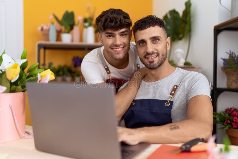 Two Hispanic Men Florists Smiling Confident Using Laptop Working at ...