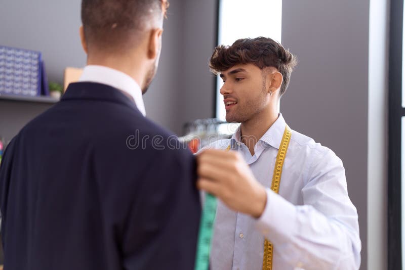 Two Hispanic Men Tailor Measuring Chest Client at Atelier Stock Photo ...