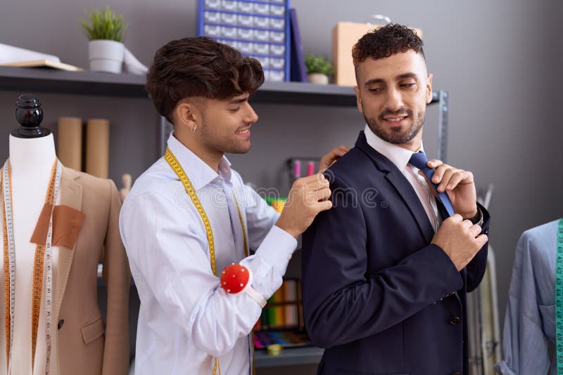 Two Hispanic Men Tailor Wearing Jacket To Client at Atelier Stock Photo ...