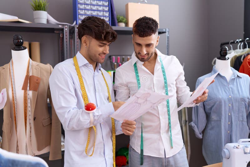 Two Hispanic Men Tailors Looking Clothing Design Speaking at Atelier ...