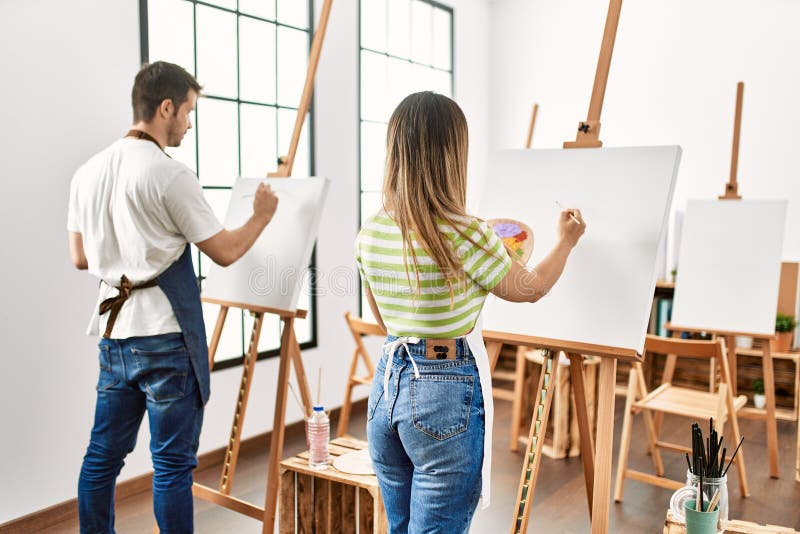 Two Hispanic Students on Back View Painting at Art Studio Stock Image ...