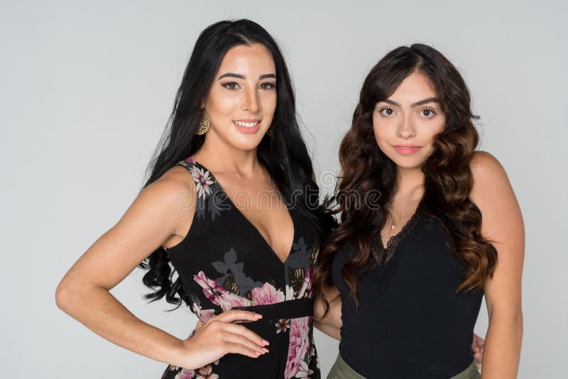 Two Hispanic Women Friends stock photo. Image of happy - 122933112