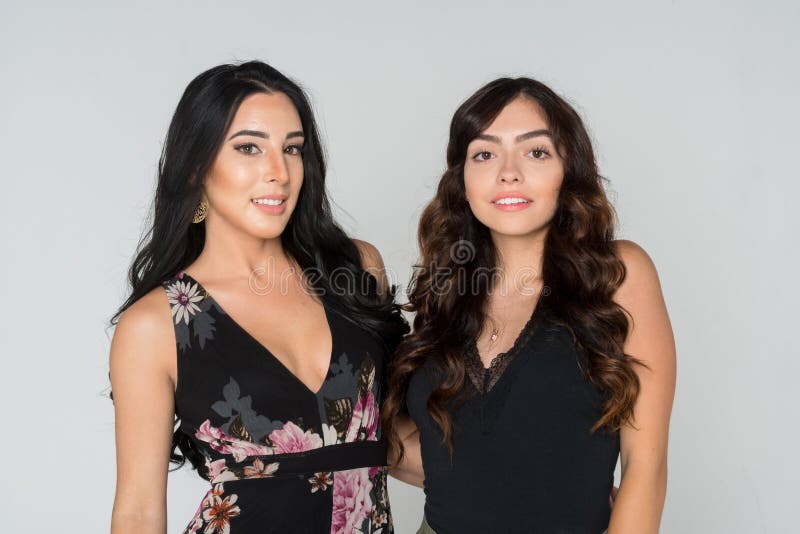 Two Hispanic Women Friends stock photo. Image of pretty - 122933290