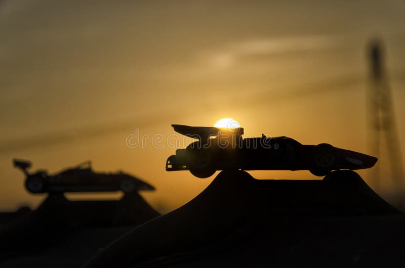 Two Historic Cars with Sunset in Background Stock Image - Image of ...