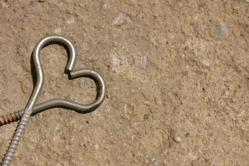 Two Hooks Arranged in the Shape of a Heart. Two Threaded Hooks on a ...