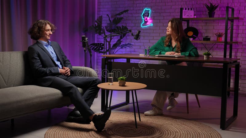 Engaging Podcast Interview at a Modern Studio with Lively Discussions ...