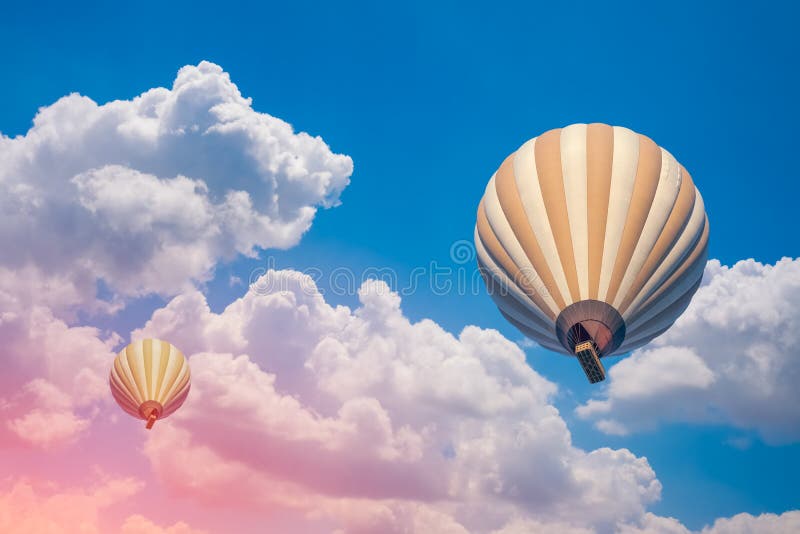 Two Hot Air Balloons with Cloudy Blue Sky Background Stock Image ...