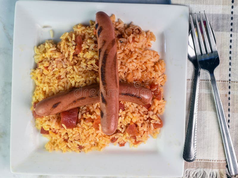 Two Hot Dogs with Rice and Diced Tomatoes Stock Image - Image of riced ...