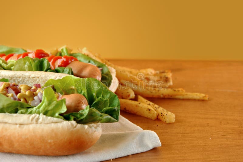 Two hot dogs with salad stock photo. Image of appetizer - 36071940