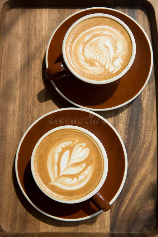 Two hot latte stock image. Image of coffeehouse, fern - 55175565