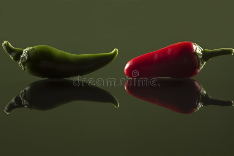 Two hot peppers stock image. Image of culinary, colorful - 27055299