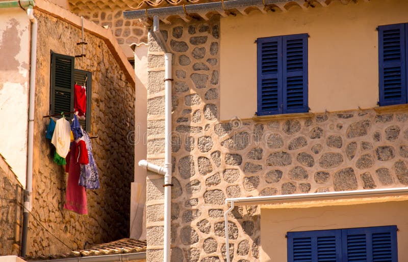 In between Two Houses in Spain Stock Photo - Image of chairs, laundry ...