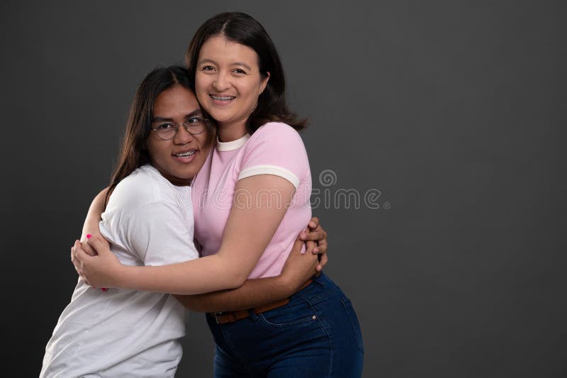Two Hugging Young People with Smiling Stock Photo - Image of adult ...
