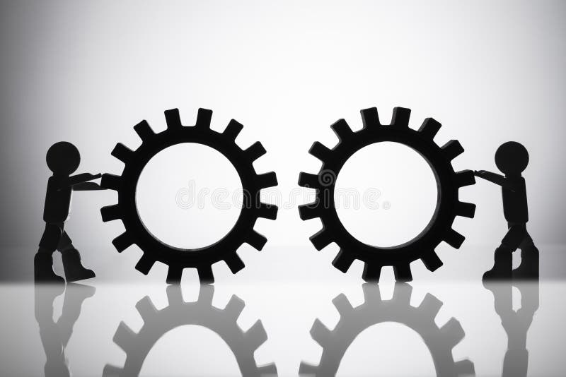 Two Human Figure Connecting Gears Stock Image - Image of engine, hold ...