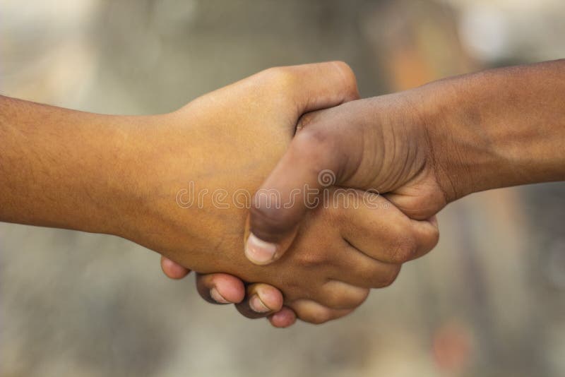 Two Human Hands are Joined Together and the Background is Blurred Stock ...