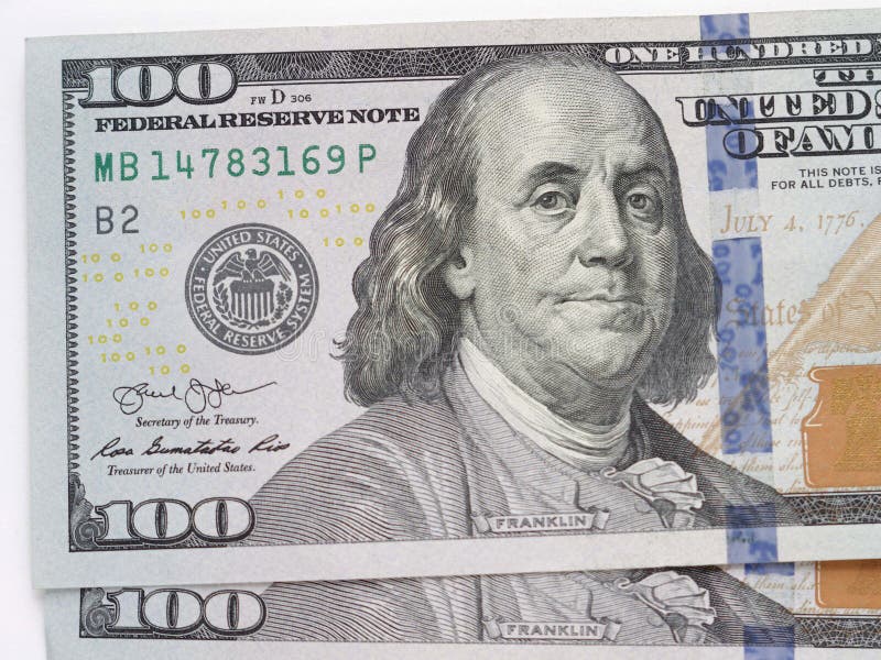 Two Hundred Dollars Bills on a Wooden Background. New Hundred Dollar ...