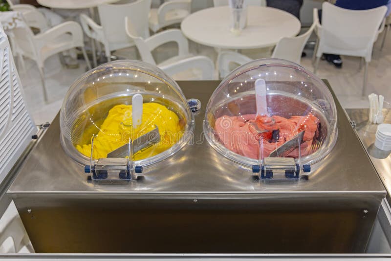 Two Ice Cream Machine stock photo. Image of yellow, cream - 245653154