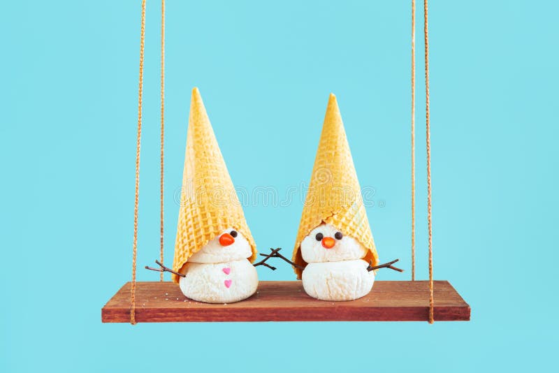 Two Ice Cream Snowmen Swing on a Swing Stock Photo - Image of cold ...