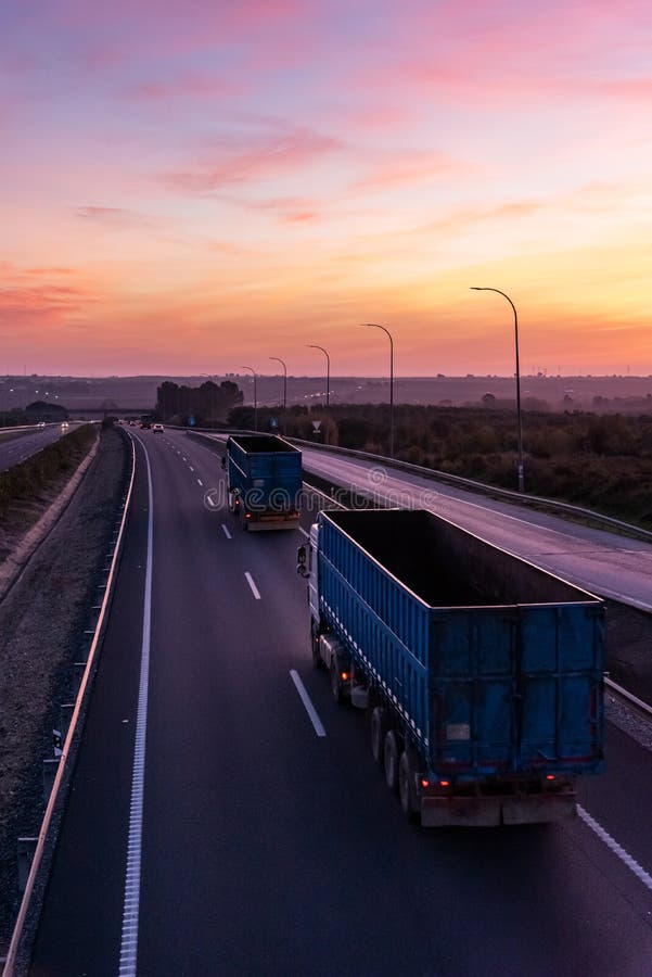 Two Identical Trucks with an Open Top Trailer Stock Photo - Image of ...