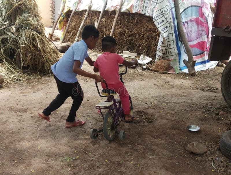 Two Indian Children Playing Cycle Editorial Photography - Image of ...