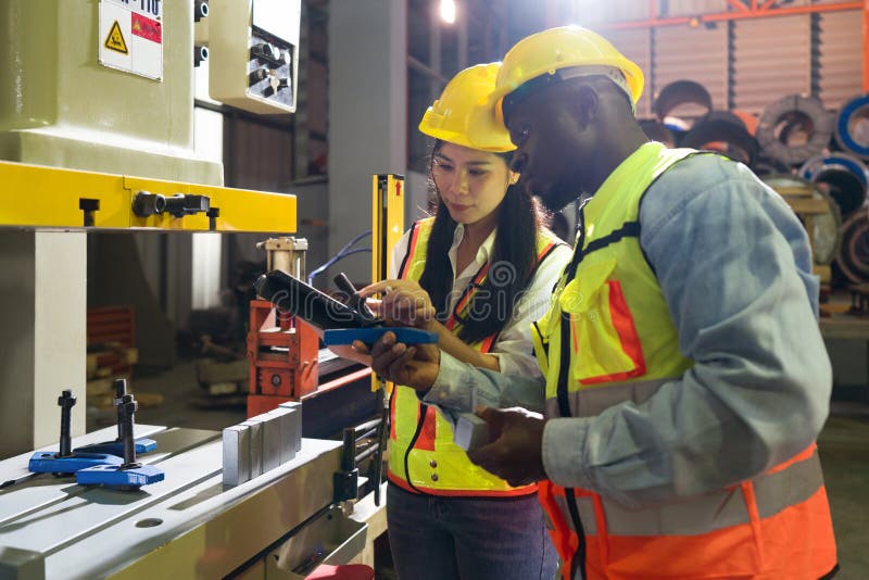 A Bustling Factory Floor, Filled with Automated Machinery Working ...