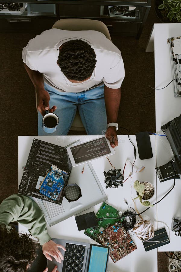 Top View of People Having Tech Meeting with Coffee Stock Photo - Image ...
