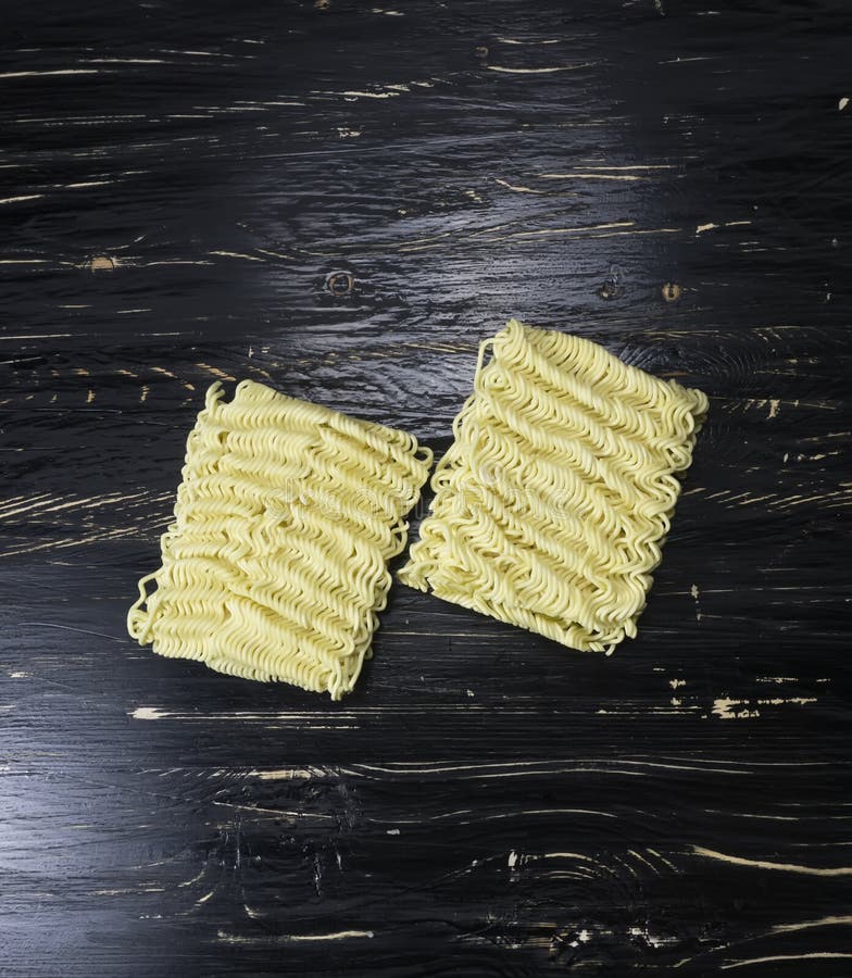 Two Indonesian Instant Noodles on a Black Table Background Stock Image ...