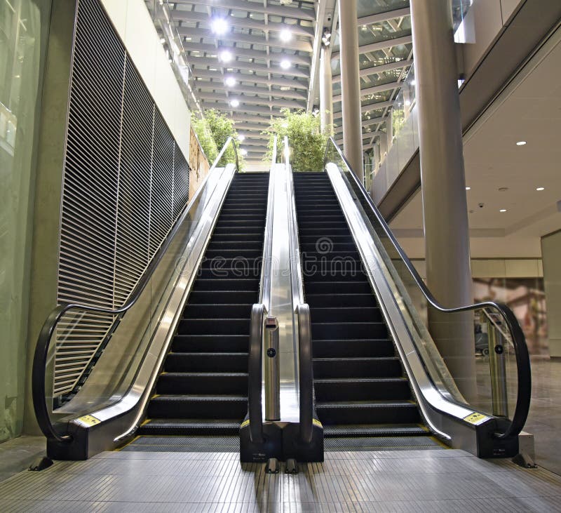 Escalator View from Side with Tiled Wall Stock Photo - Image of indoor ...