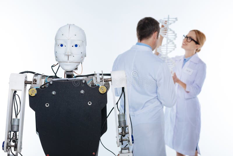 Two Inspired Scientist Studying DNA Molecule in a Lab Stock Image ...