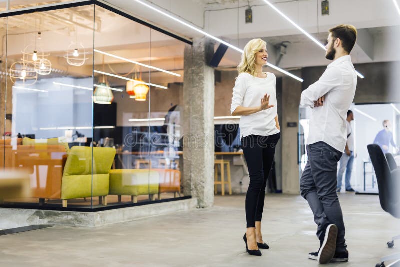 Two Intelligent Coworkers Talking Stock Image - Image of table ...