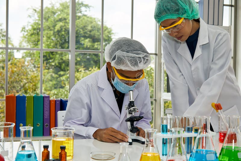 Two Intensive Scientists Deeply Involved Research in Modern Laboratory ...