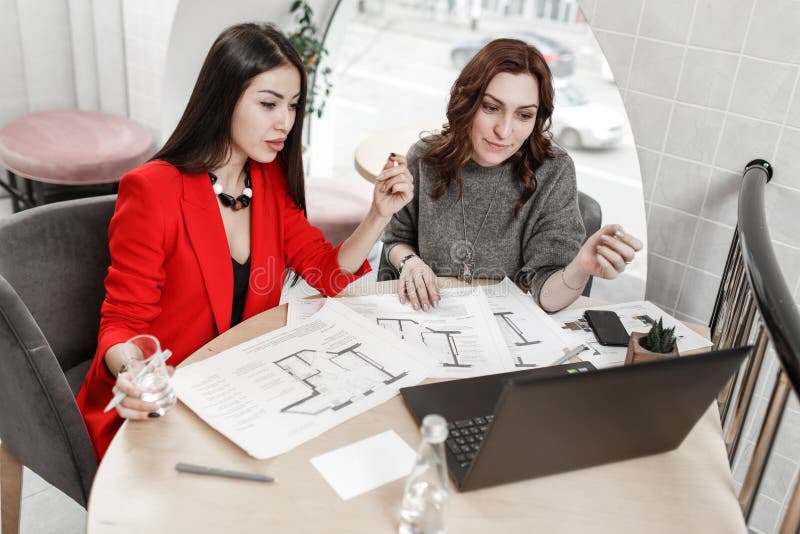 The Two Interior Designers are Working at the New Interior Design ...