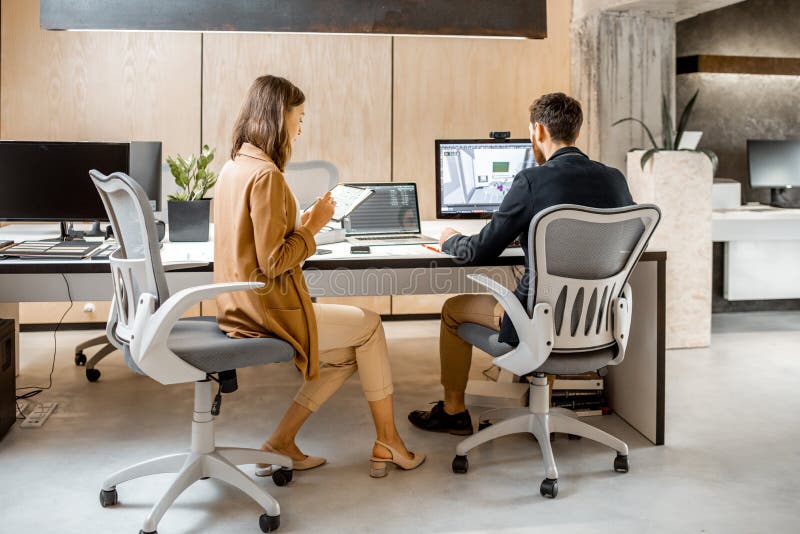 Two Interior Designers Working in the Office Stock Image - Image of ...