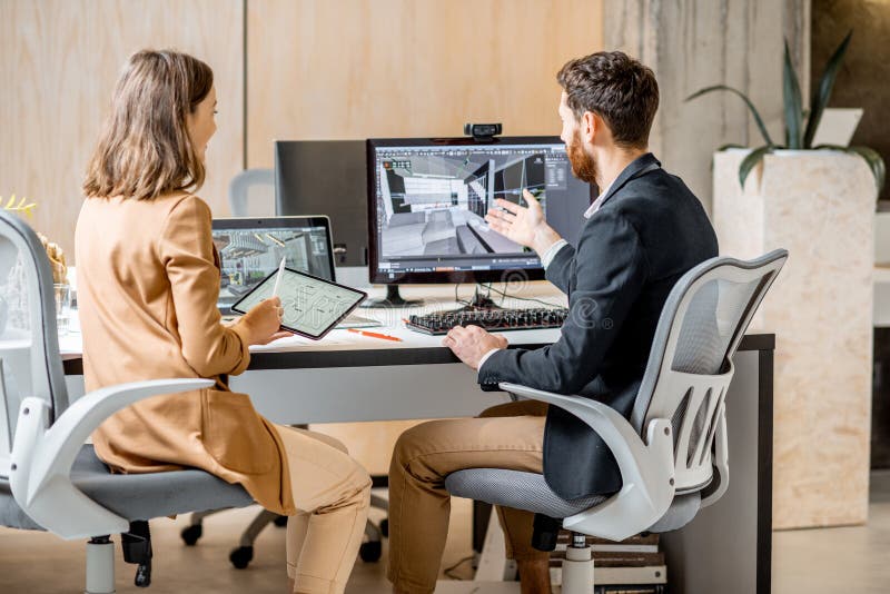 Two Interior Designers Working in the Office Stock Image - Image of ...