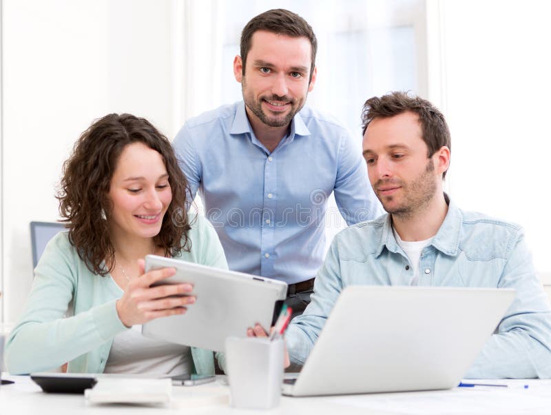 Two Interns Working Together Assisted by Their Course Supervisor Stock ...