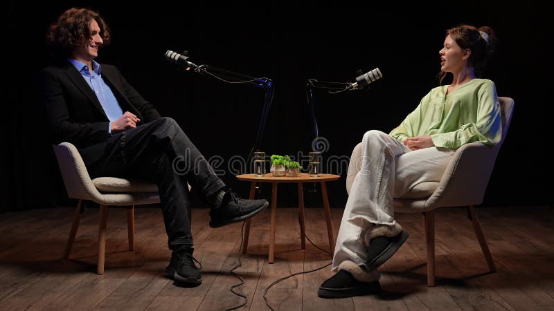 Inspiring Conversations Unfold in a Cozy Podcast Studio Setup Stock ...