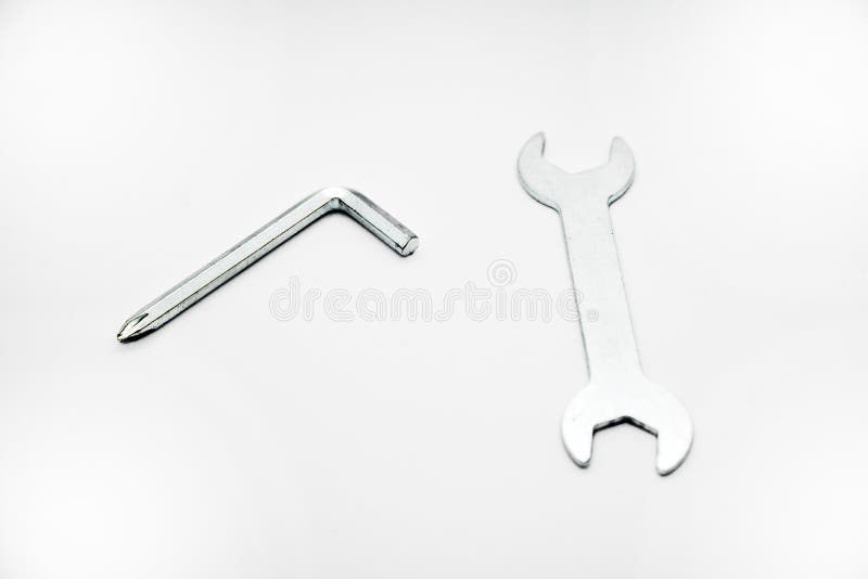 Two Iron Construction Keys on a White Background. a Horn Wrench and a ...