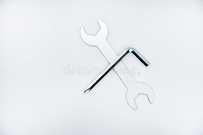 Two Iron Construction Keys on a White Background. a Horn Wrench and a ...