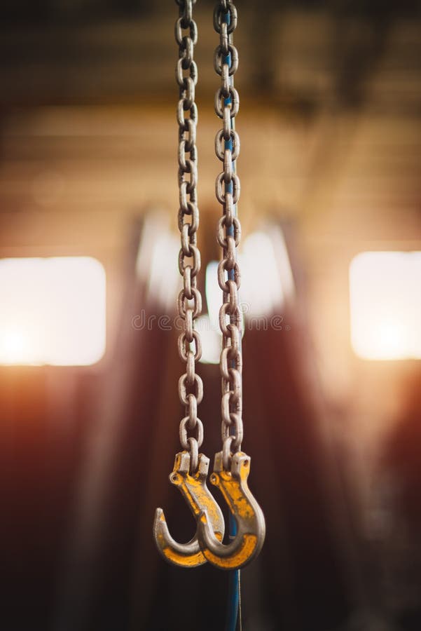Two Iron Hooks Hang on Chains Stock Photo - Image of tool, lifting ...