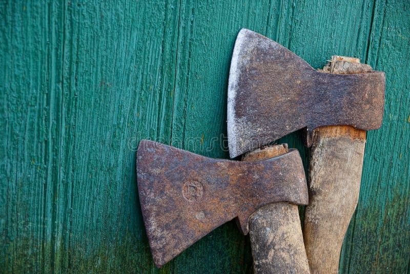 Two Old Ax on the Background of a Green Wall Stock Image - Image of ...