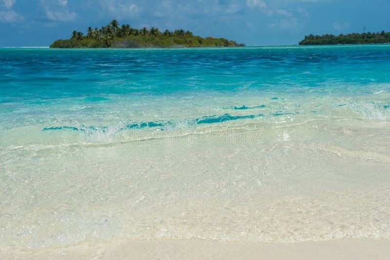 Two Islands in the Ocean, Beach with White Sand and Blue Water Stock ...