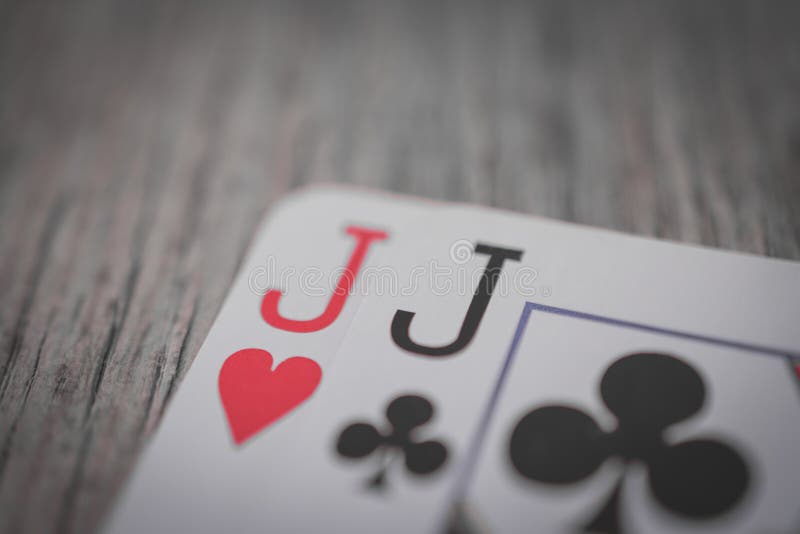Two Jack, Playing Cards in Hand on the Table, Poker Nands Stock Image ...