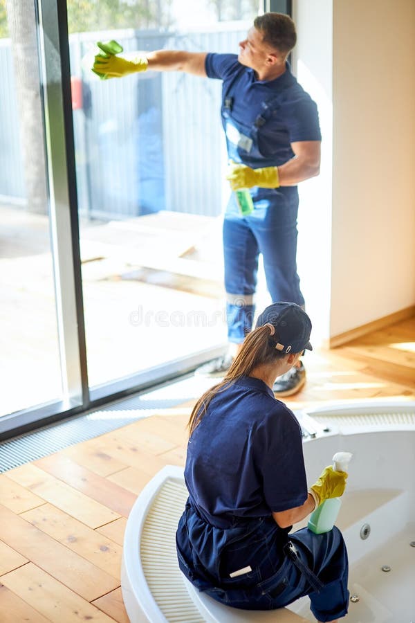 Two Janitors Cleaning Bathroom Stock Photo - Image of hygiene, cleaner ...