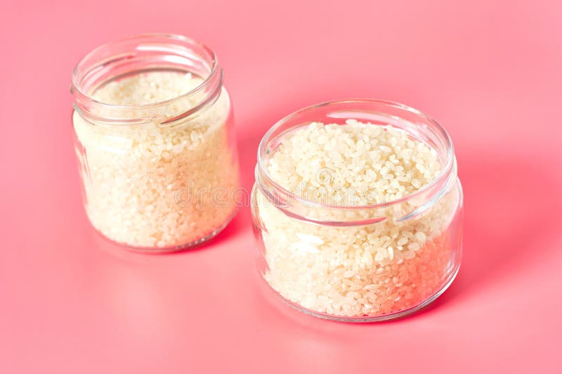 Jars of Grain of Rice on Pink Background Stock Image - Image of culture ...